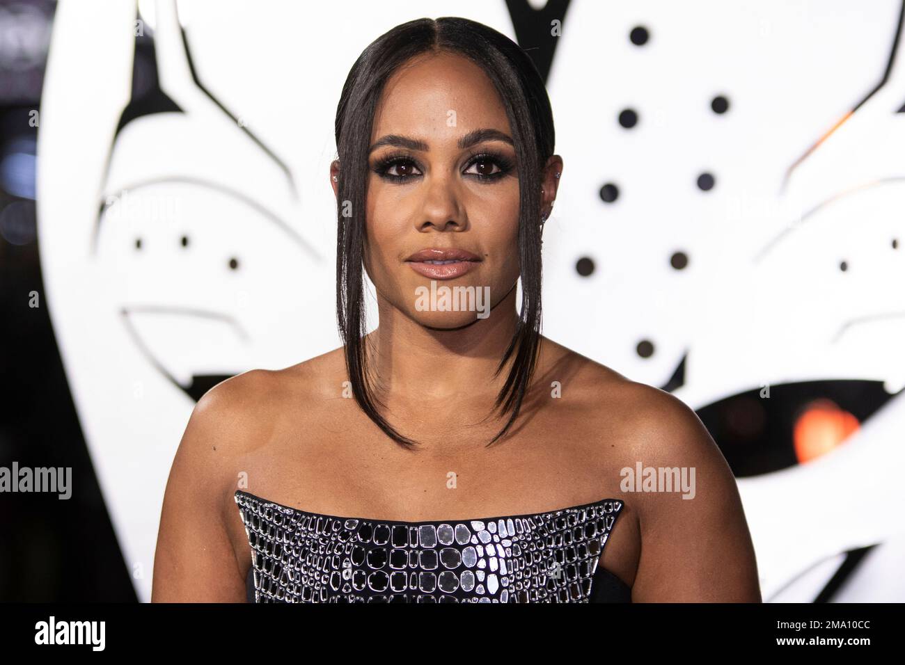 Alex Scott poses for photographers upon arrival for the premiere of the ...