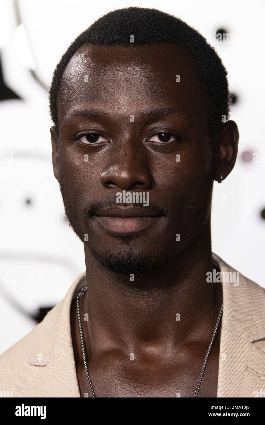 David Larbi poses for photographers upon arrival for the premiere of ...