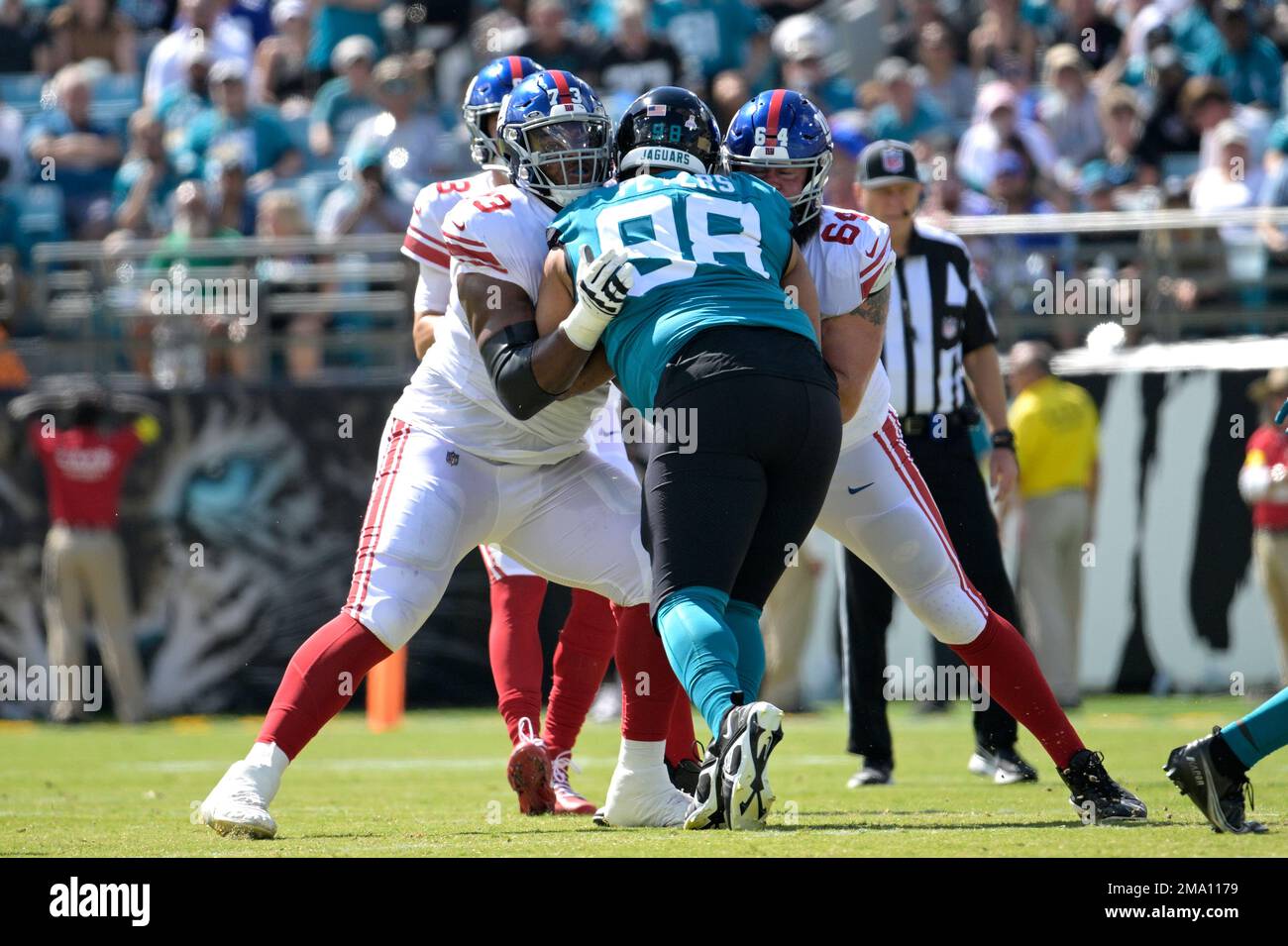 New York Giants offensive tackle Evan Neal (73) and guard Mark ...