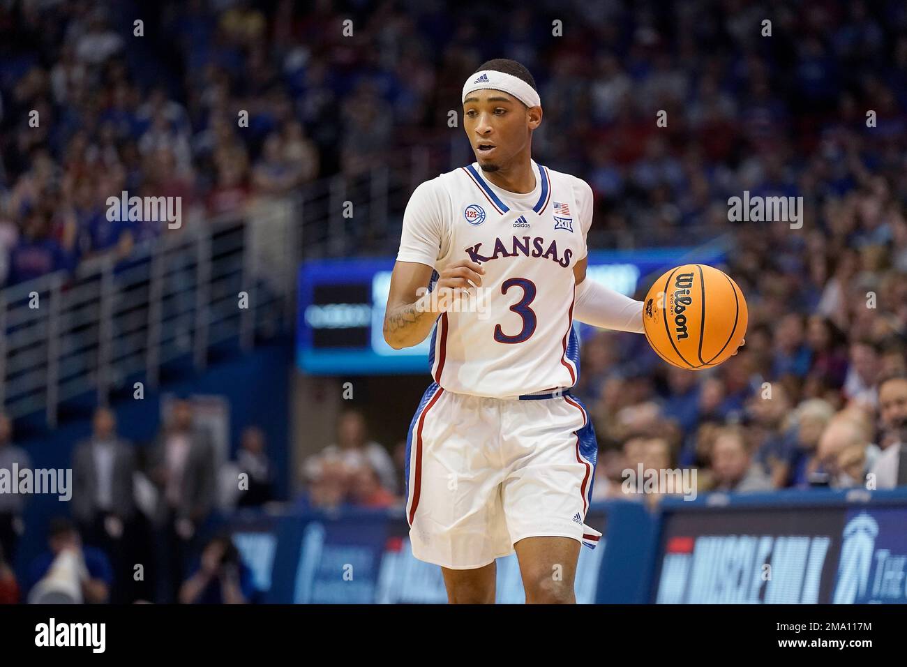 Kansas guard Dajuan Harris Jr. drives during the first half of an NCAA ...