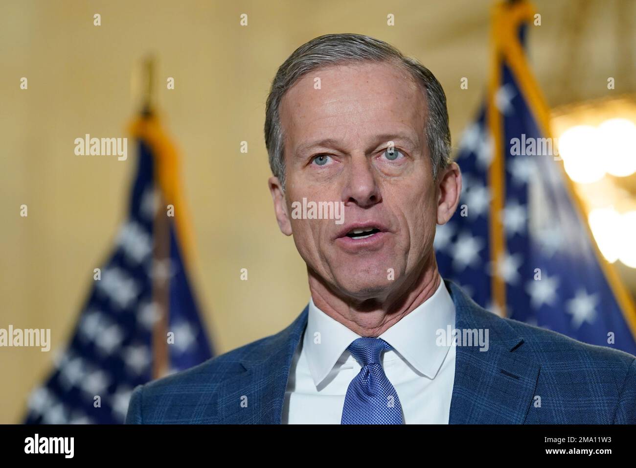 FILE - Sen. John Thune, R-S.D., talks with reporters on Capitol Hill in ...