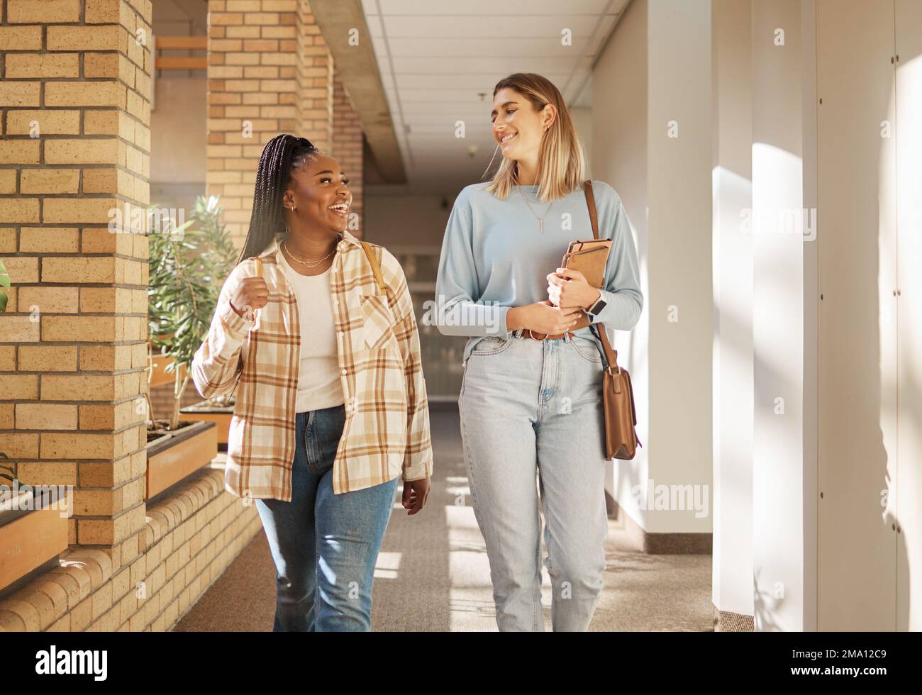 School, education and university students, women or people walking to ...