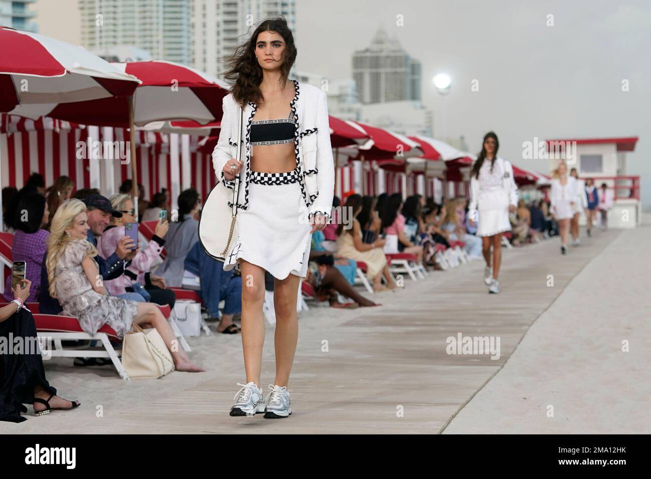 A model walks on the runway during the Chanel Cruise 2022/23 Replica ...
