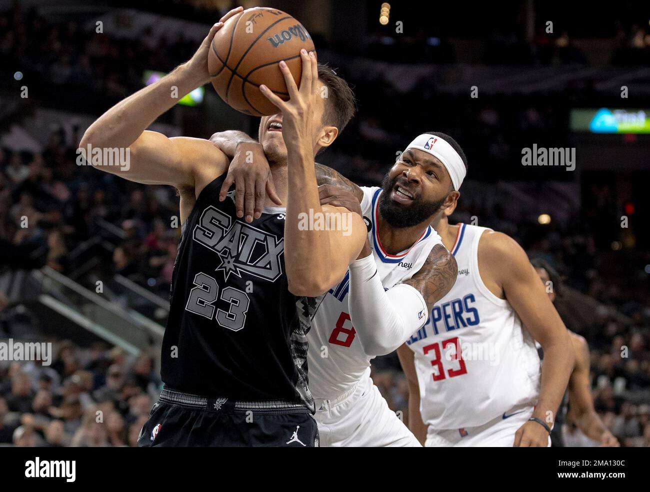 Los Angeles Clippers forward Marcus Morris Sr. (8) grabs San Antonio ... Los Angeles Clippers forward Marcus Morris Sr. (8) grabs San Antonio ...