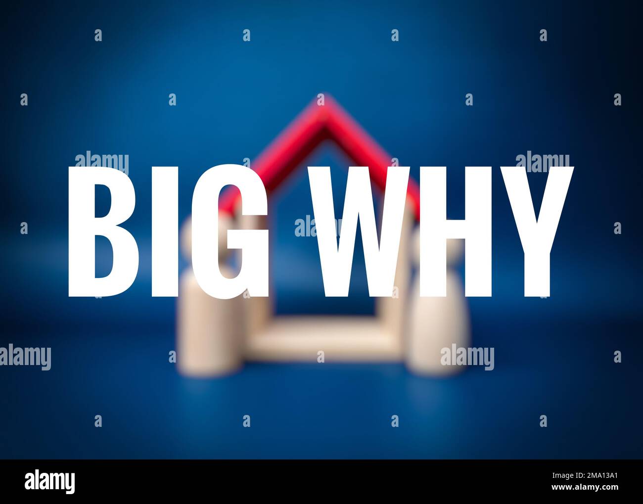 Blur wooden doll and wooden house with the word BIG WHY Stock Photo - Alamy