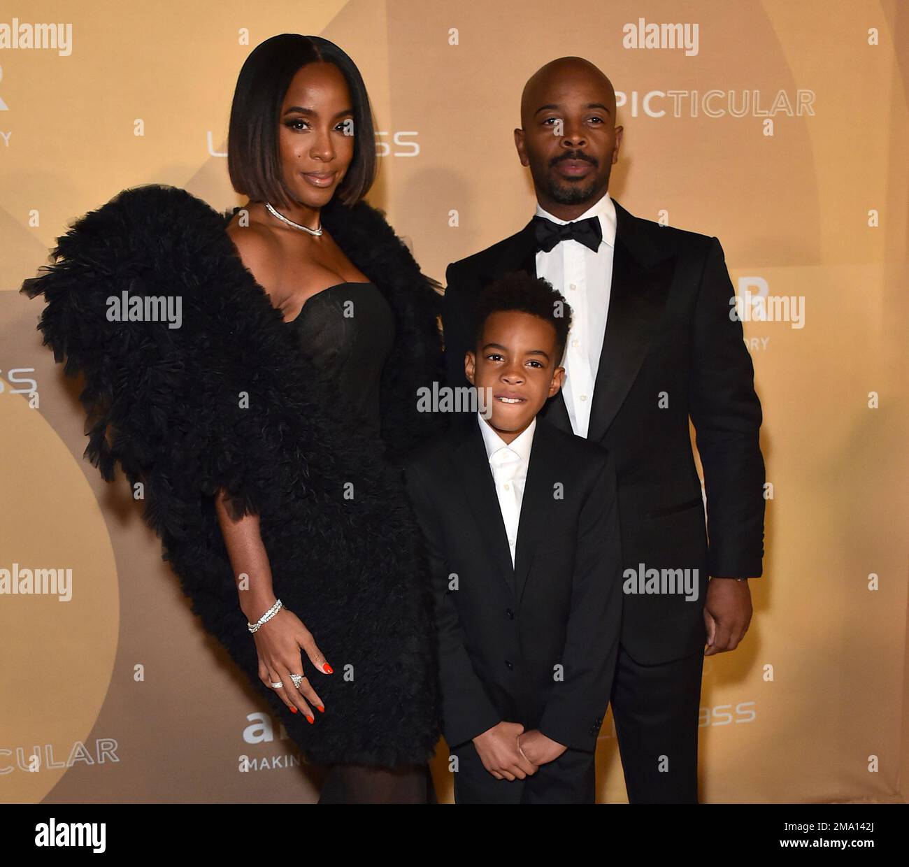 Kelly Rowland, Titan Witherspoon and Tim Witherspoon arrive at the ...