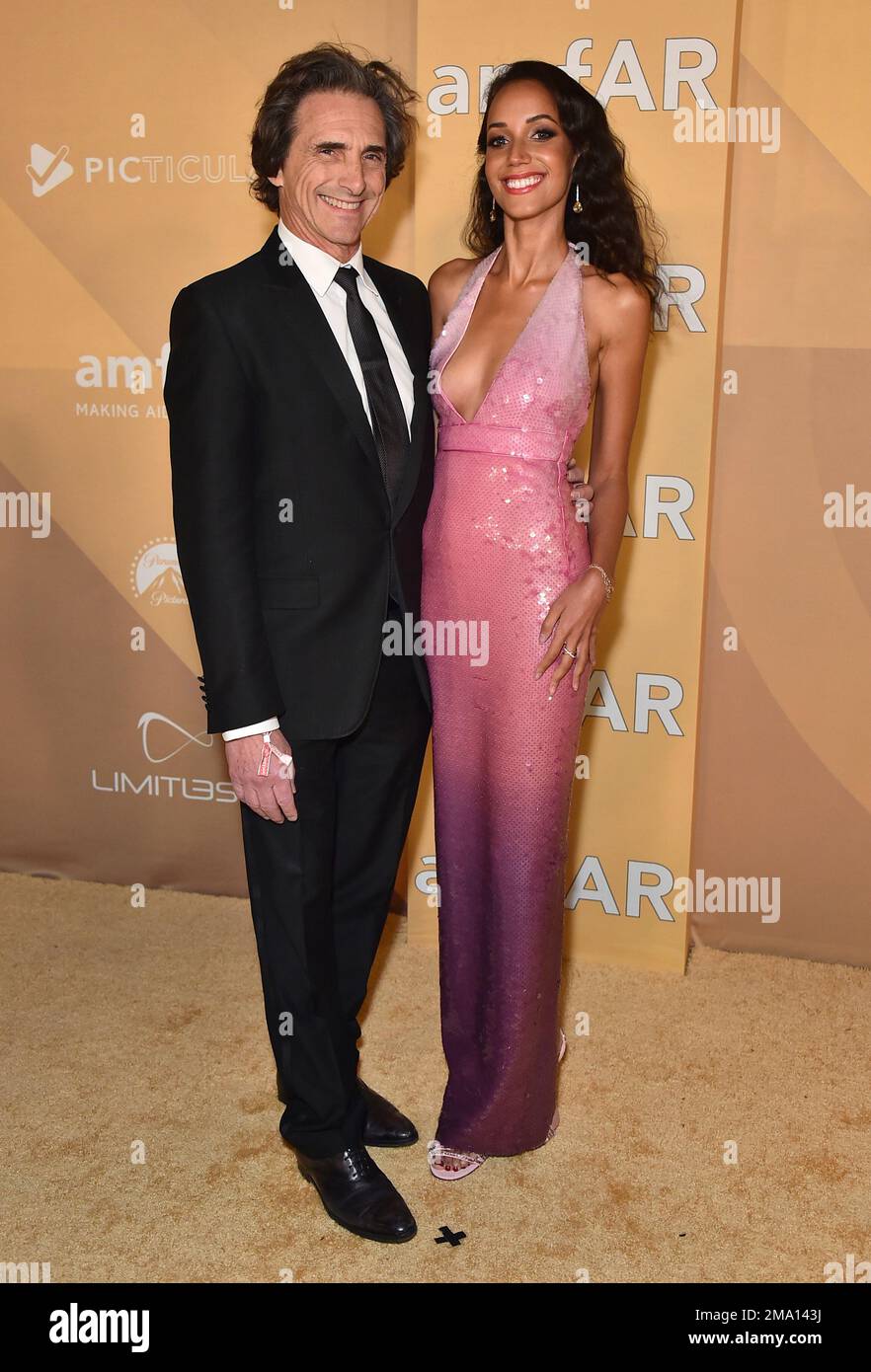 Lawrence Bender and Cindy Cederlund arrive at the amfAR Gala Los ...