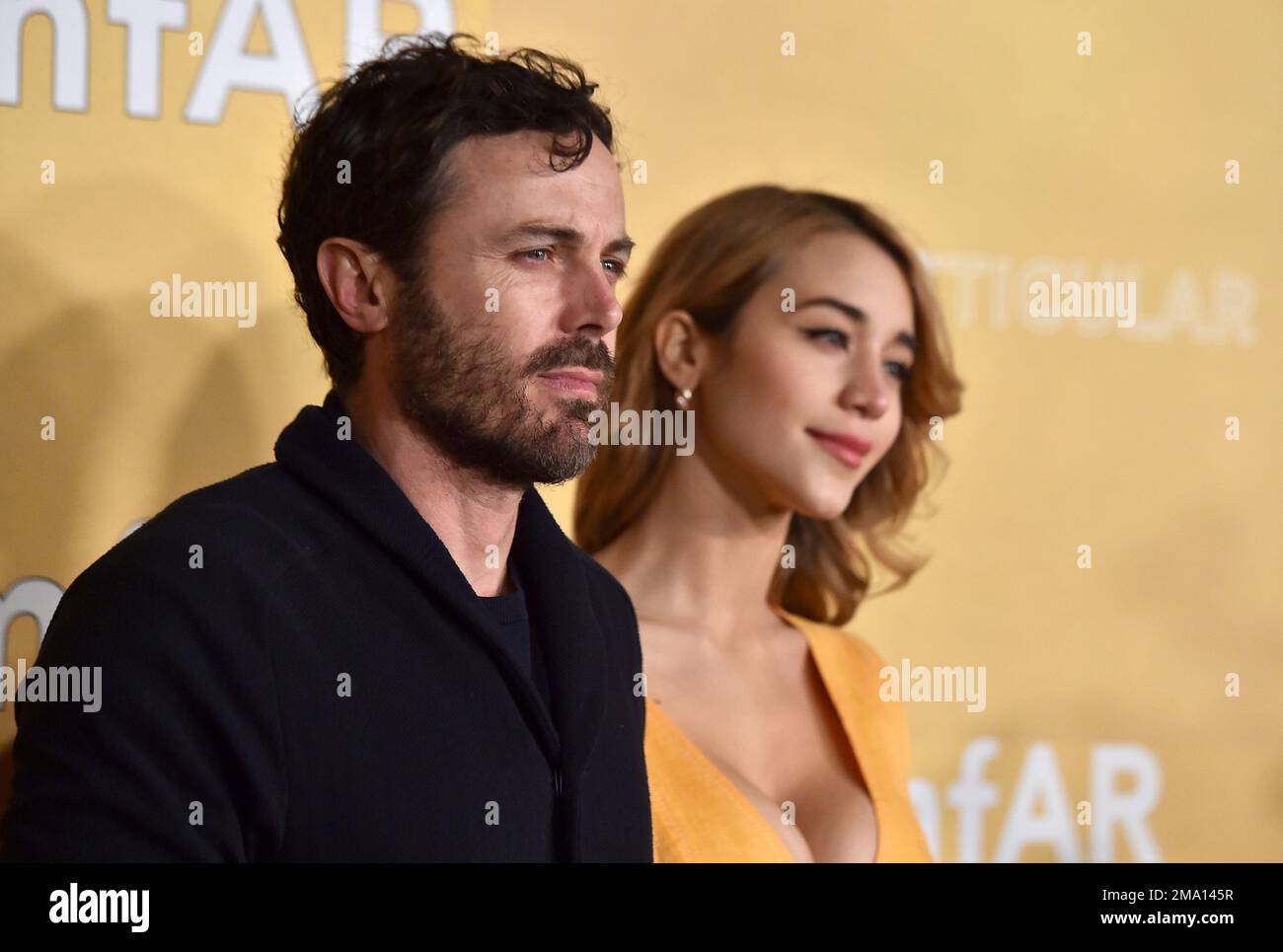 Caylee Cowan and Casey Affleck arrive at the amfAR Gala Los Angeles at ...