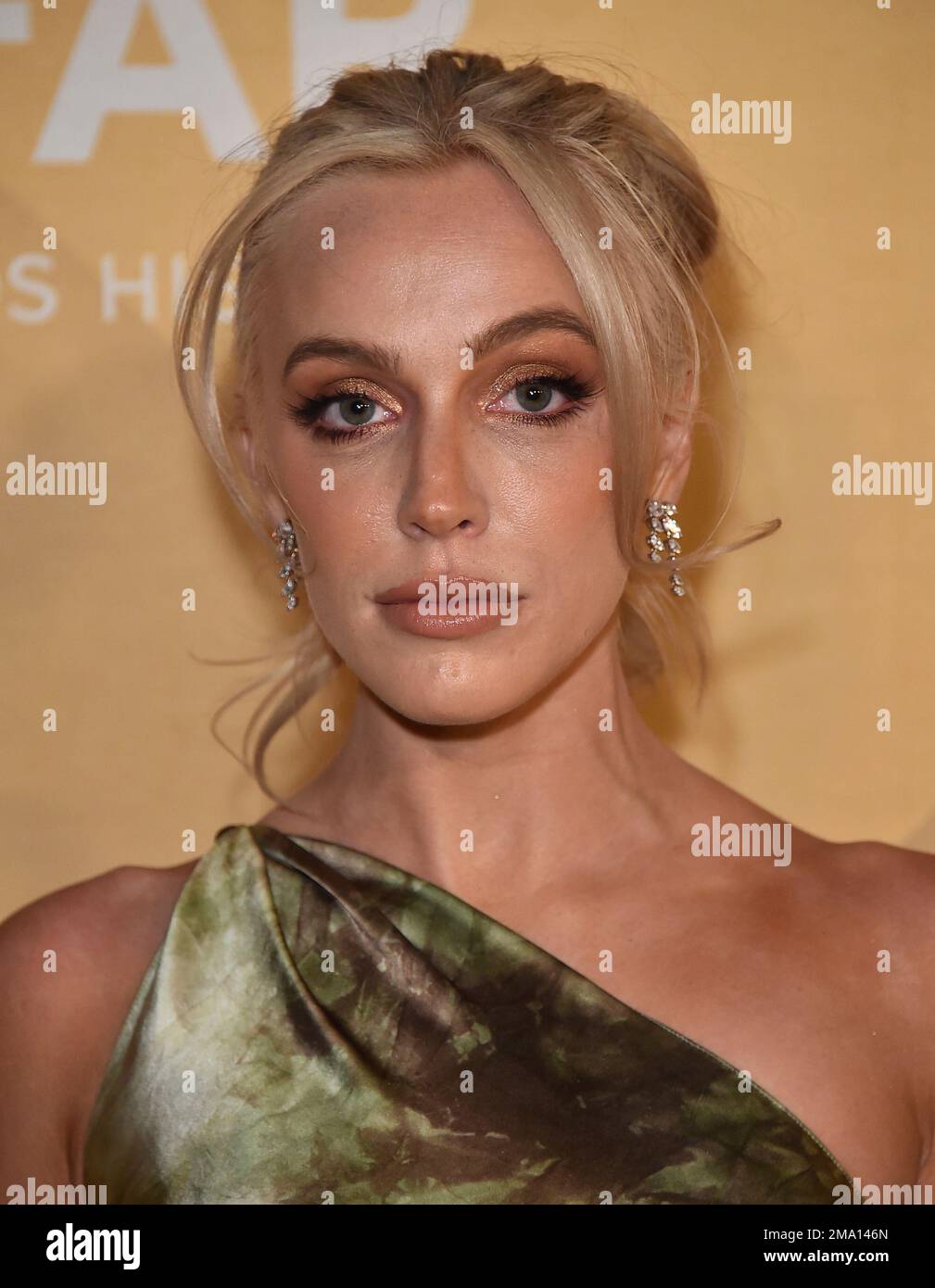 Alex Cooper arrives at the amfAR Gala Los Angeles at The Pacific Design ...