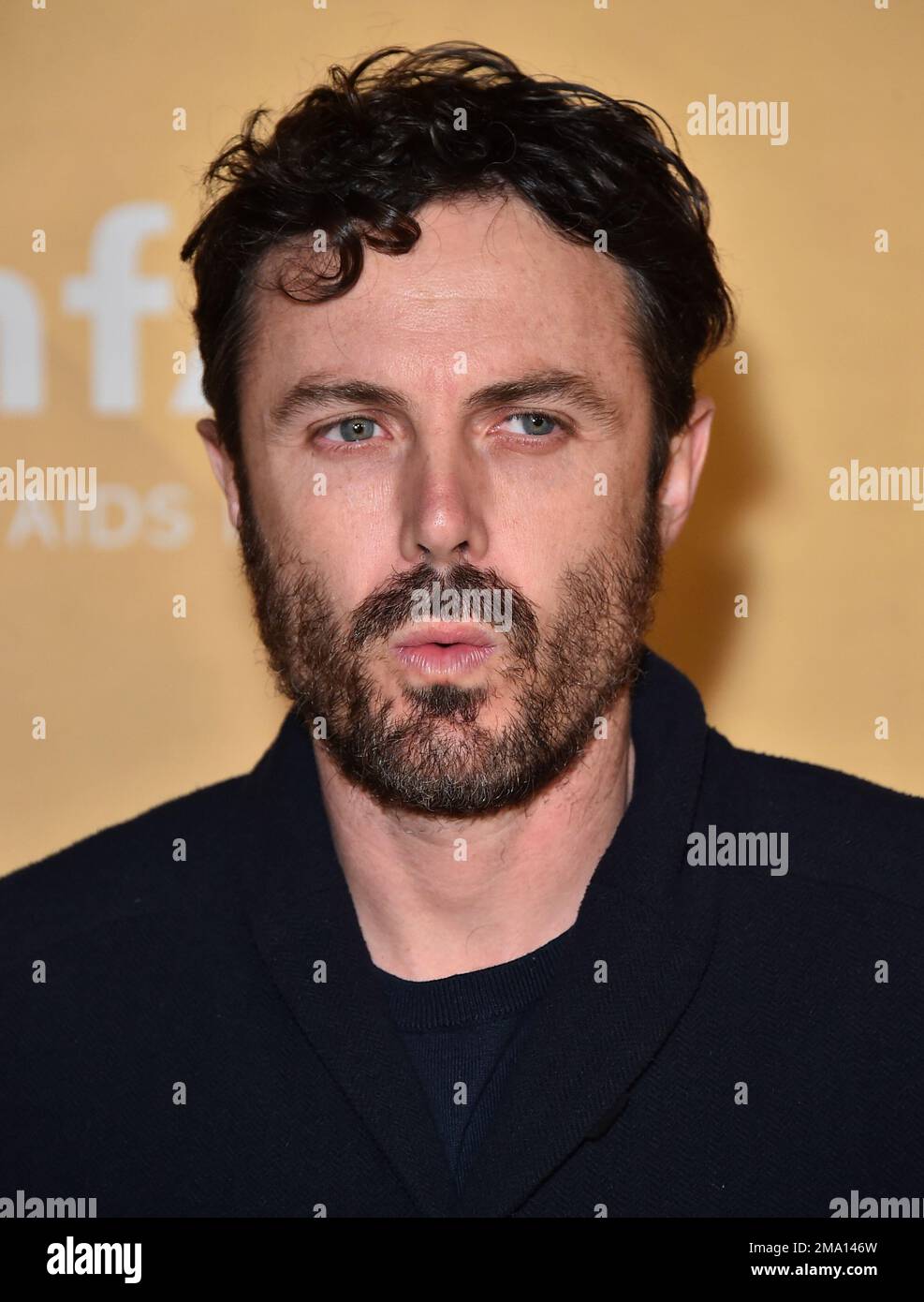 Casey Affleck arrives at the amfAR Gala Los Angeles at The Pacific ...