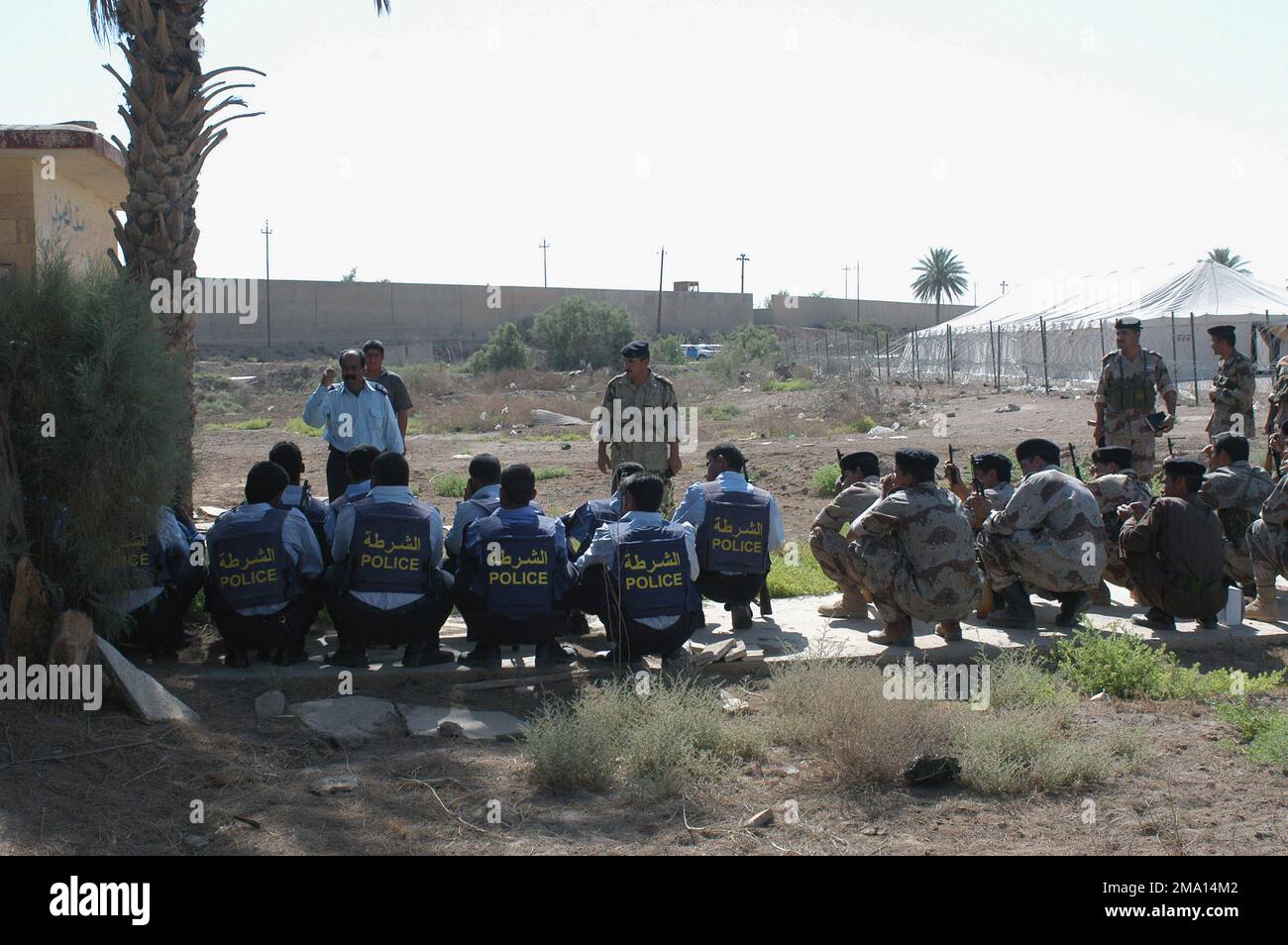 040606-M-5555L-116. [Complete] Scene Caption: Iraqi Civil Defense Corps ...