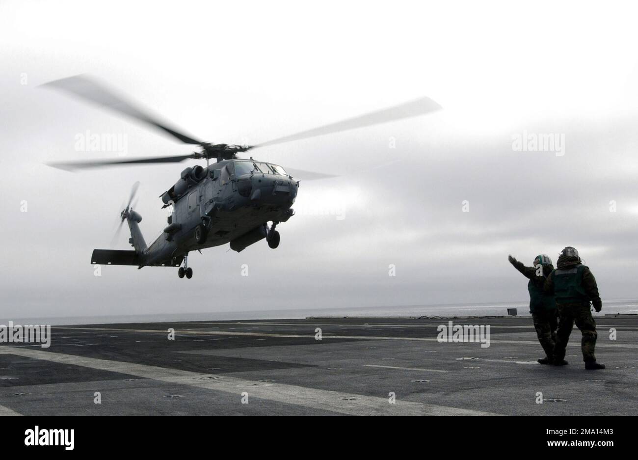 040606-F-9208L-002. [Complete] Scene Caption: A US Navy (USN) SH-60F ...