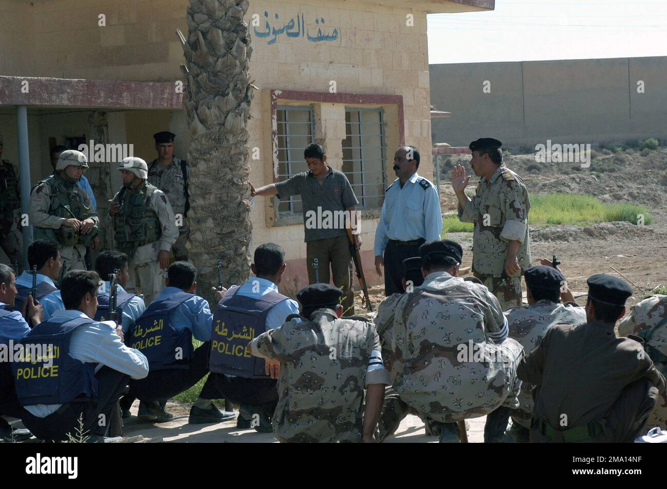 040606-M-5555L-126. [Complete] Scene Caption: Iraqi Civil Defense Corps ...