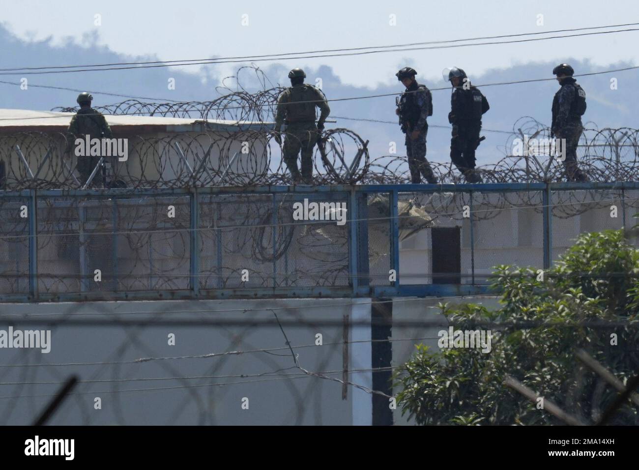 Police walk on top of Litoral Penitentiary amid days of deadly clashes ...