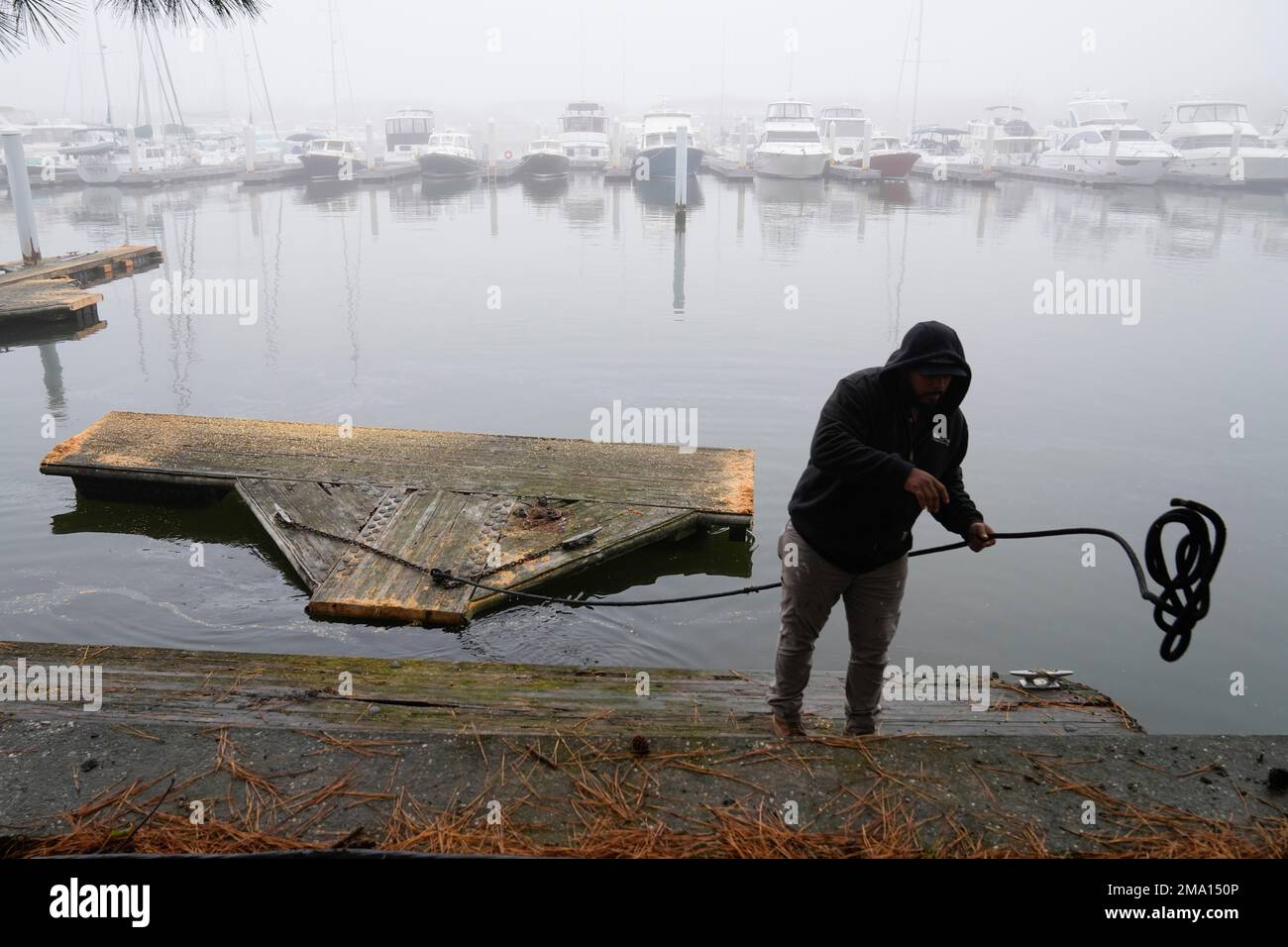 Fog blankets over boats docked at the Bay Bridge Marina as Jared DeLeon ...