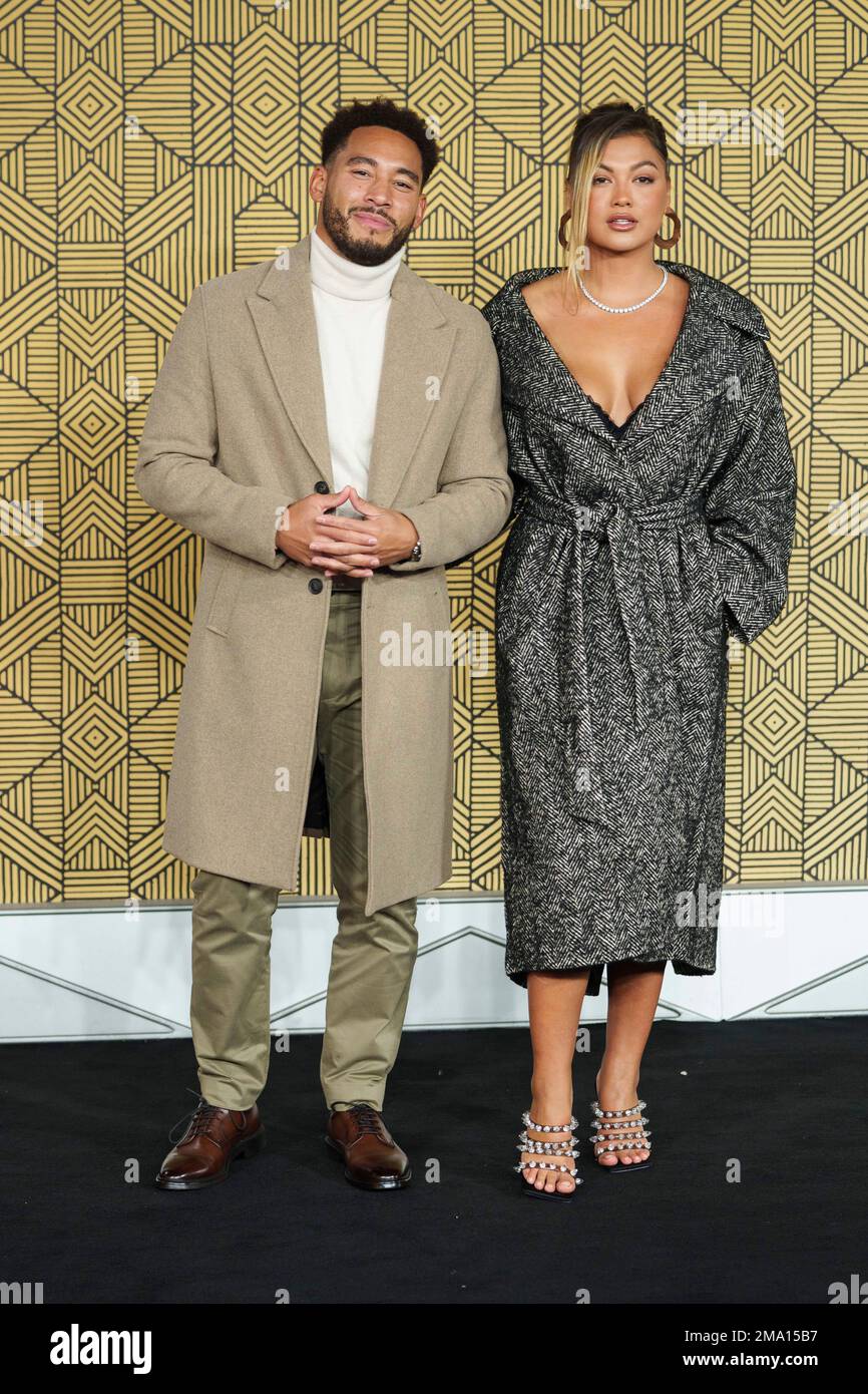 Josh Denzel, left, and Ruby Wong pose for photographers upon arrival ...