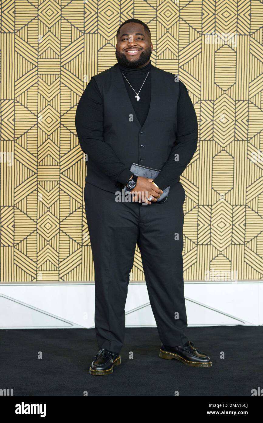 Bash The Entertainer poses for photographers upon arrival for the ...