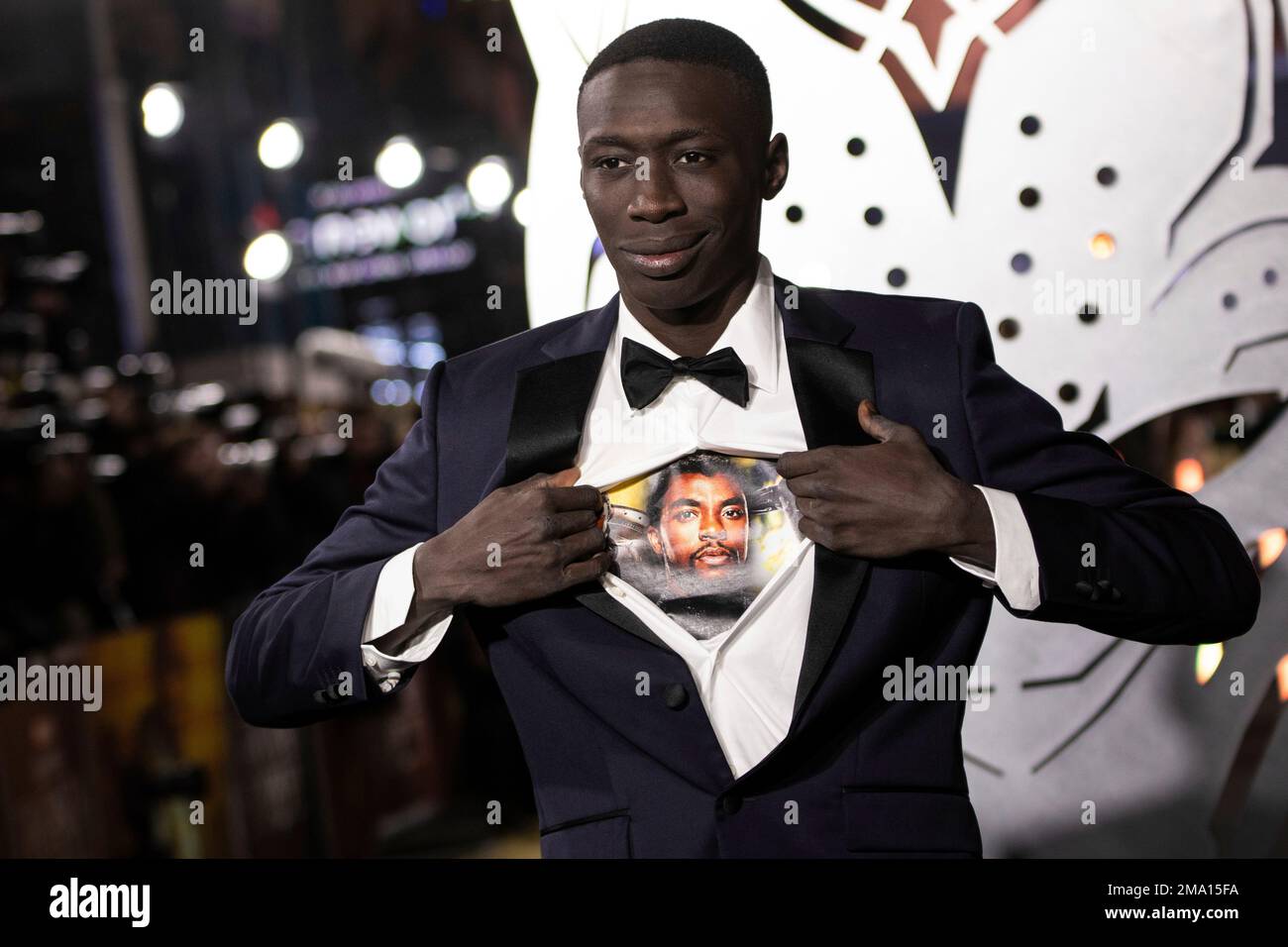 Khaby Lame opens his shirt to reveal the image of Chadwick Boseman upon ...