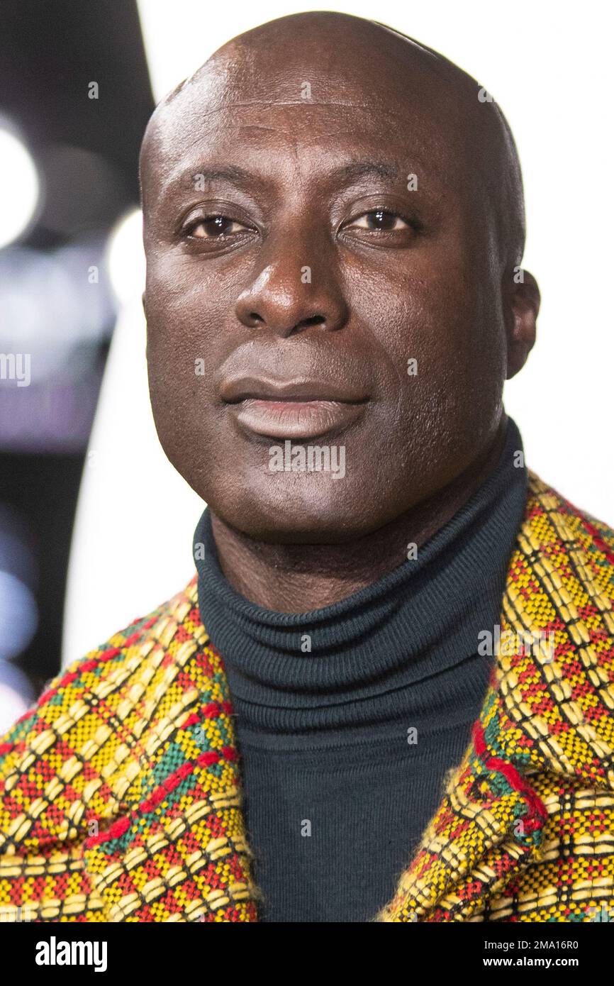 Ozwald Boateng poses for photographers upon arrival for the premiere of ...