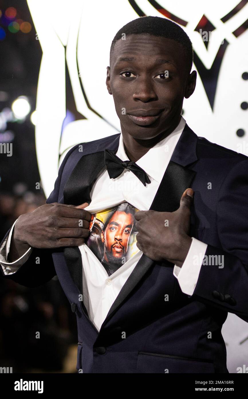 Khaby Lame opens his shirt to reveal the image of Chadwick Boseman upon ...