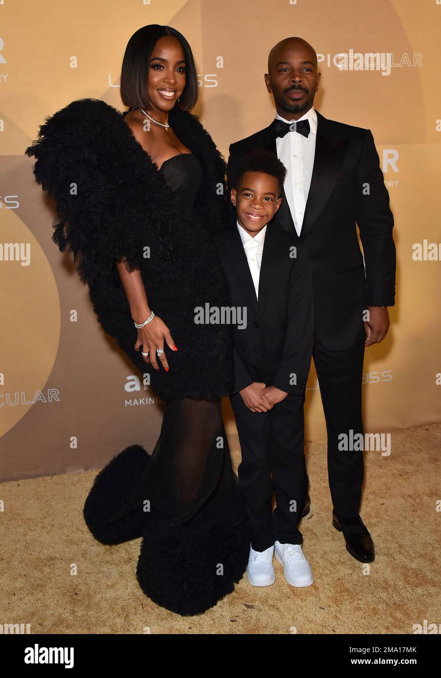 From left, Kelly Rowland, Titan Weatherspoon and Tim Weatherspoon ...