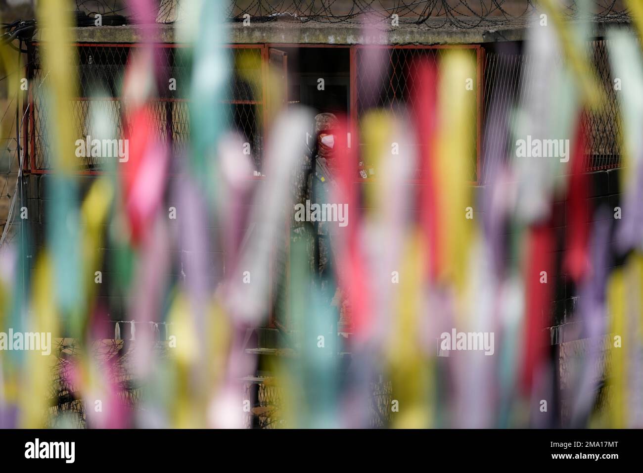 A South Korean army soldier stands guard inside a military guard post ...