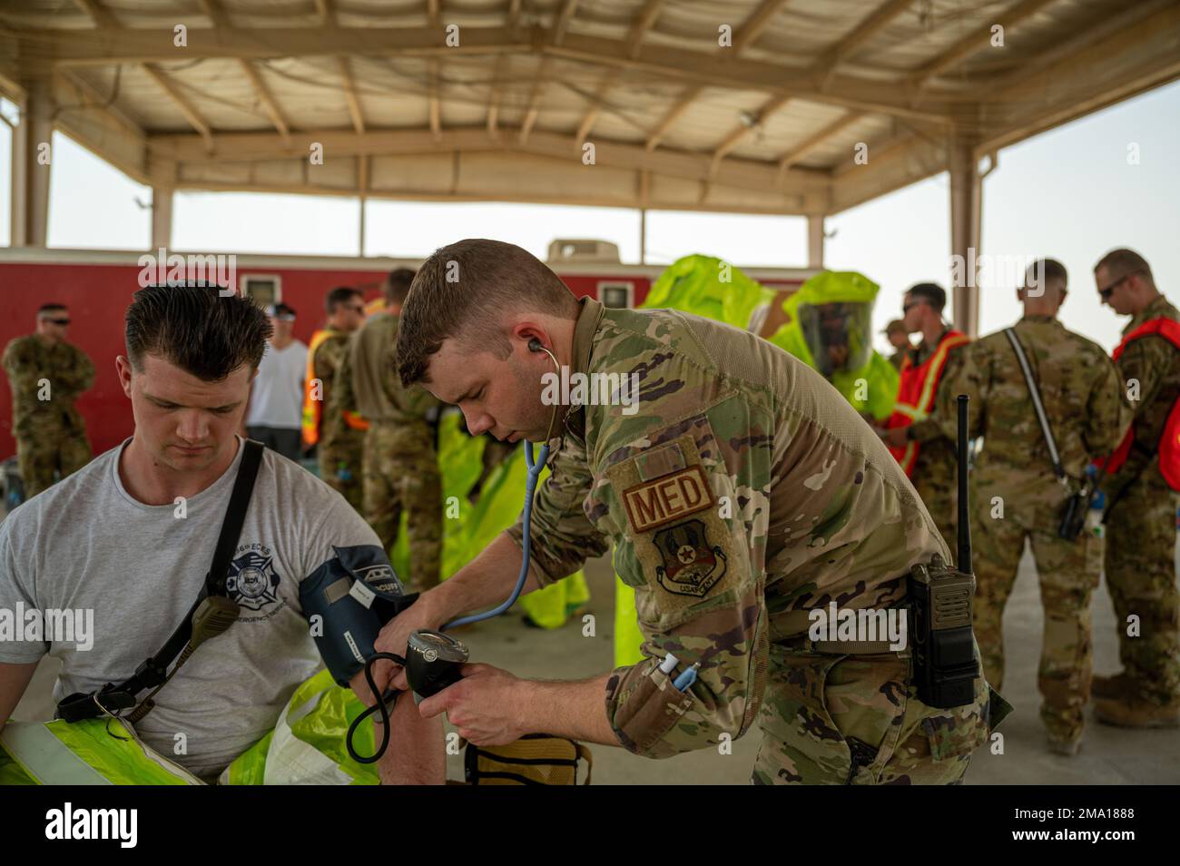 U.S. Air Force Airman 1st Class Mac Jarvis, left, firefighter, 386th ...