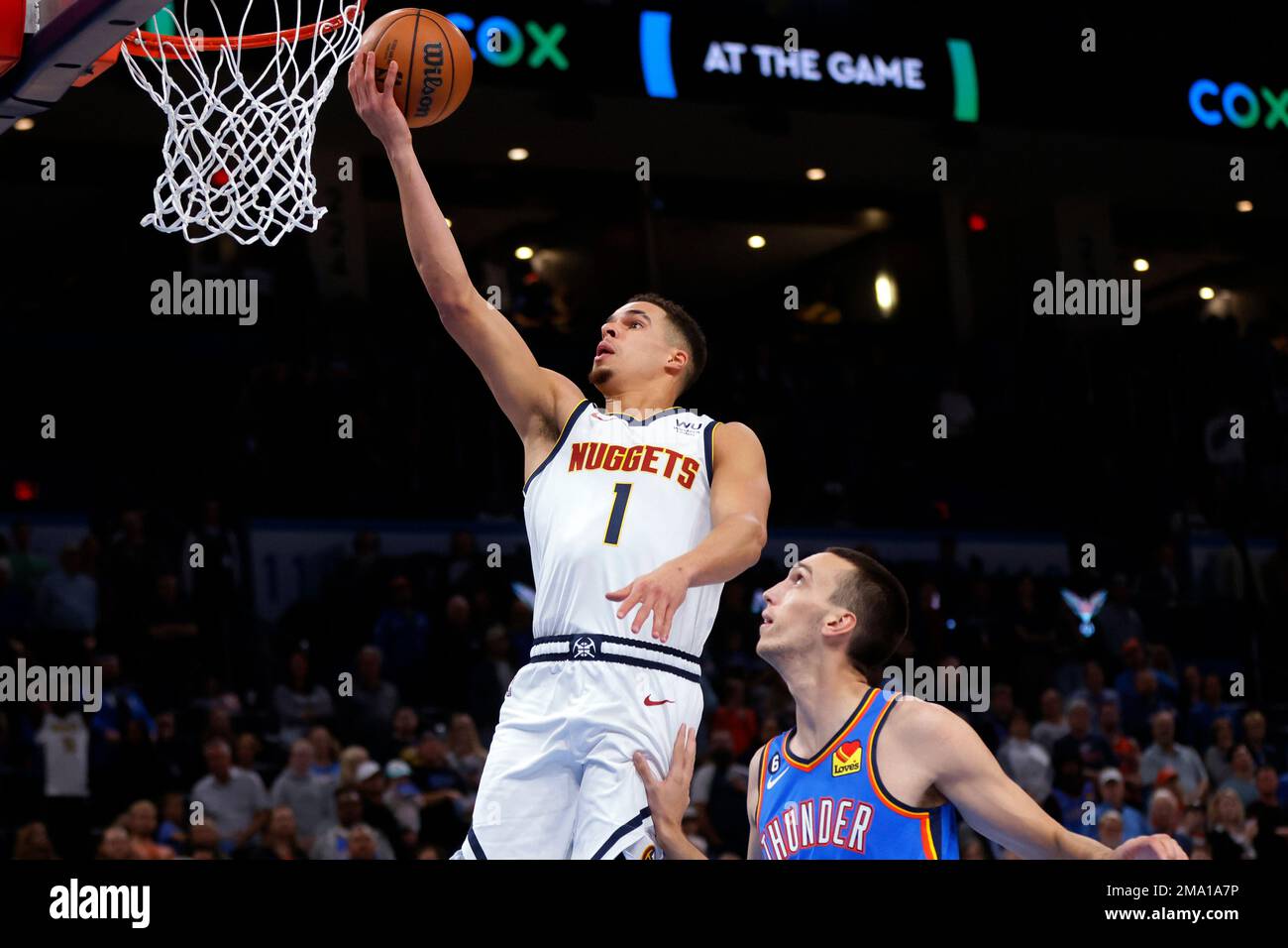 Denver Nuggets forward Michael Porter Jr. shoots next to Oklahoma City ... Denver Nuggets forward Michael Porter Jr. shoots next to Oklahoma City ...