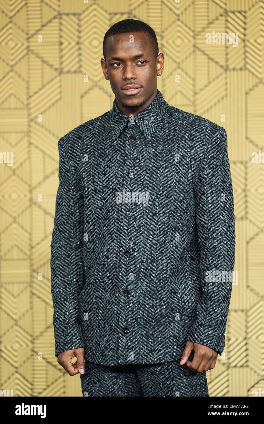 Michael Ward poses for photographers upon arrival for the premiere of the film 'Black Panther ...