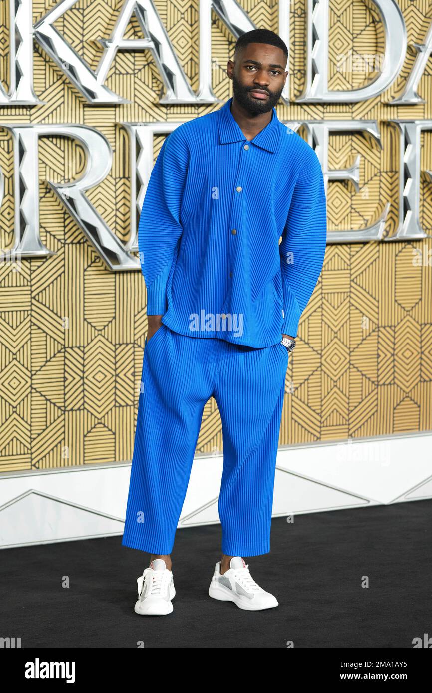 Santan Dave poses for photographers upon arrival for the premiere of ...