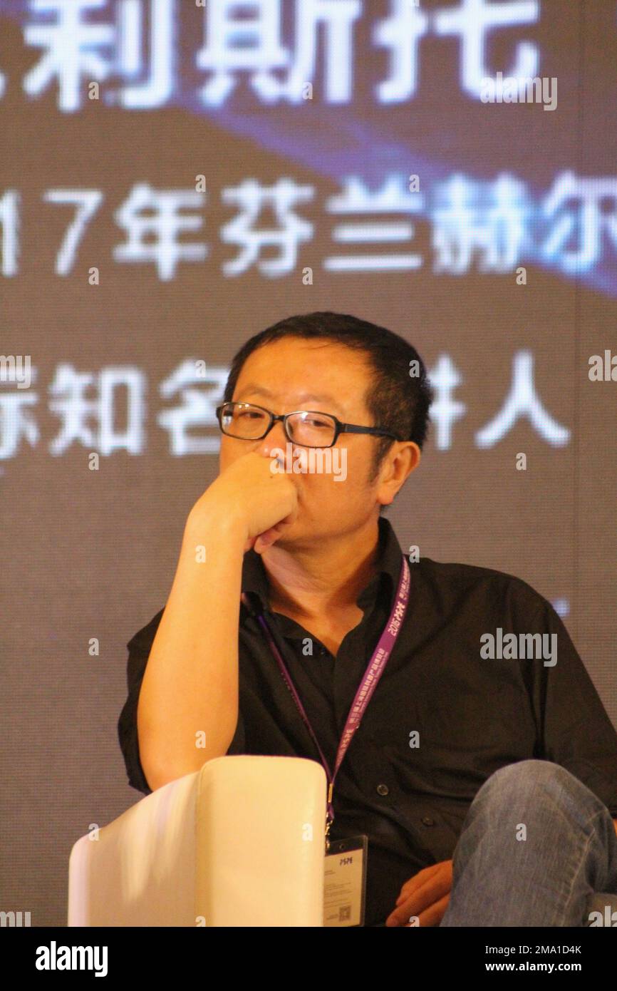 (FILE) Hugo Award winner Liu Cixin and Yao Haijun, editor-in-chief of ...
