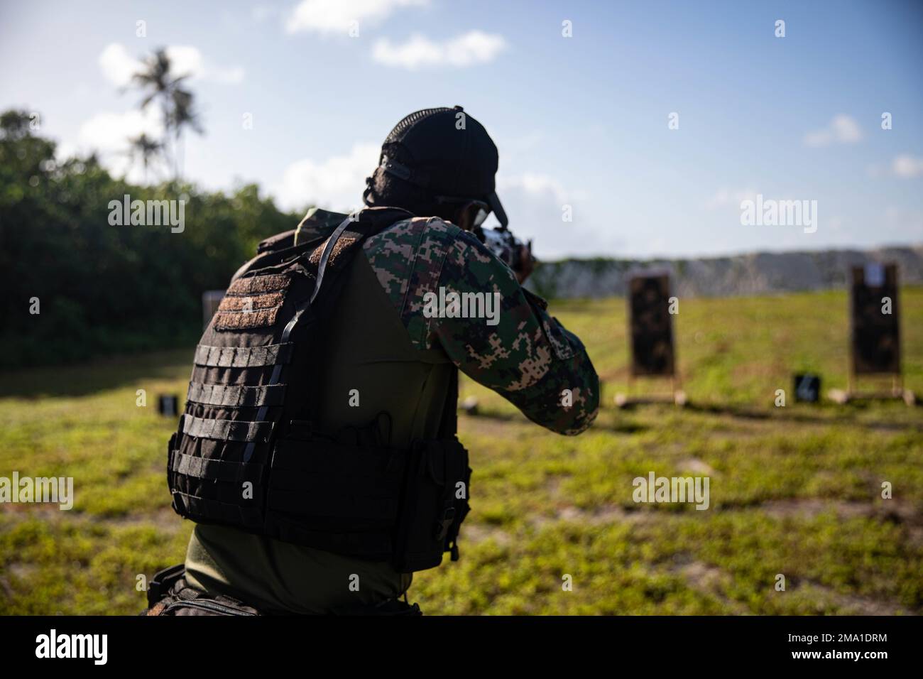 A member of the Maldives National Defense Forces conducts a live fire ...