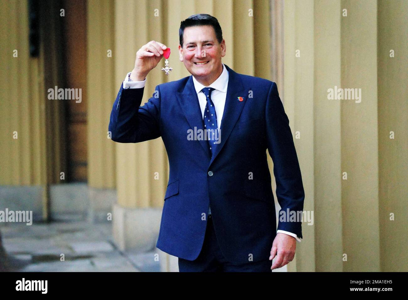 British artist Tony Hadley poses with his award after being made a ...