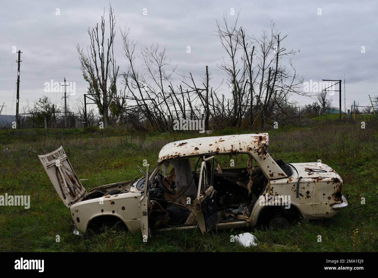 A Russian-made Lada car damaged by fighting in the village of Dolyna ...