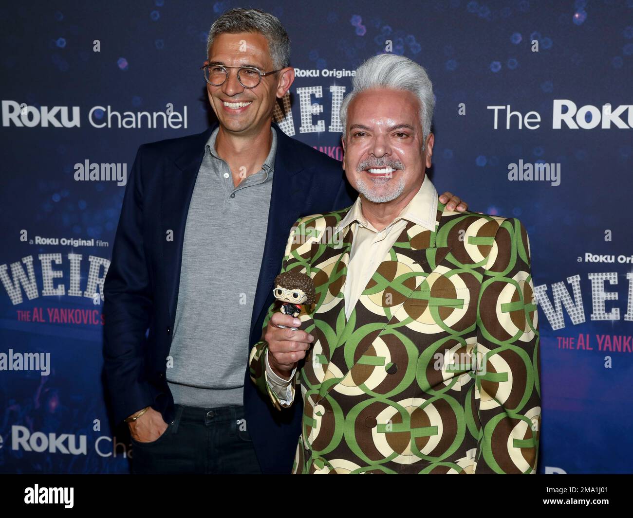 Henry Munoz, left, and Mike Farah, right, attend the premiere of "Weird ...