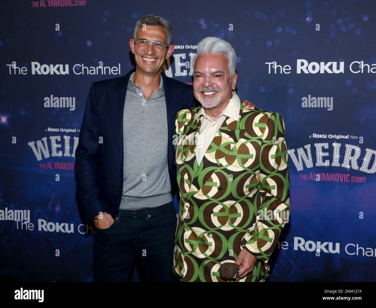 Henry Munoz, left, and Mike Farah, right, attend the premiere of "Weird ...