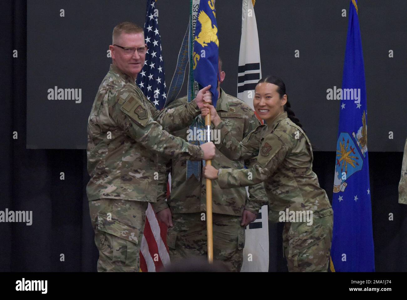 Col. Brian Moore, left, 51st Maintenance Group commander, presents Maj ...