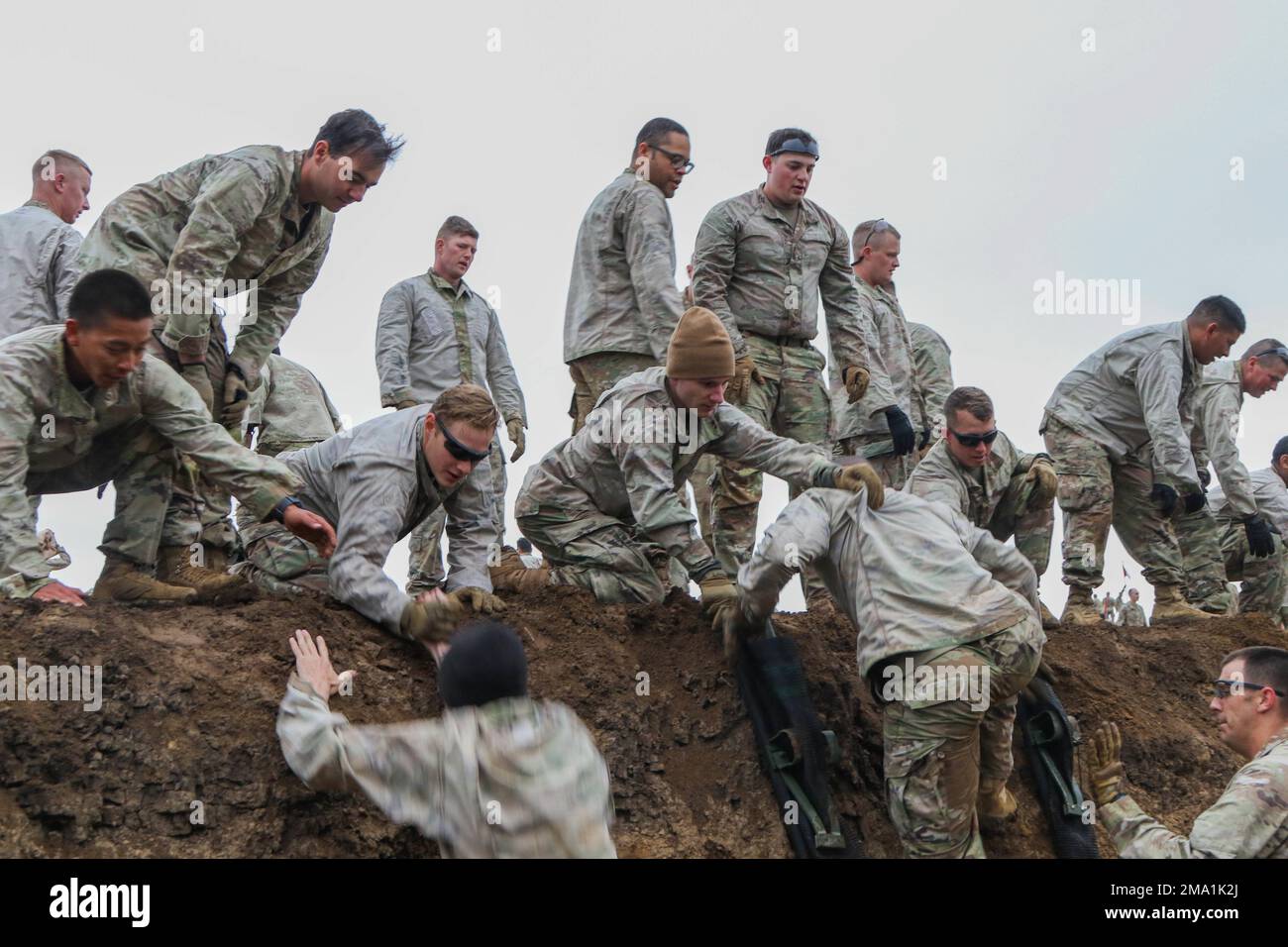 Soldiers assigned to the 4th Infantry Division and Fort Carson pull ...