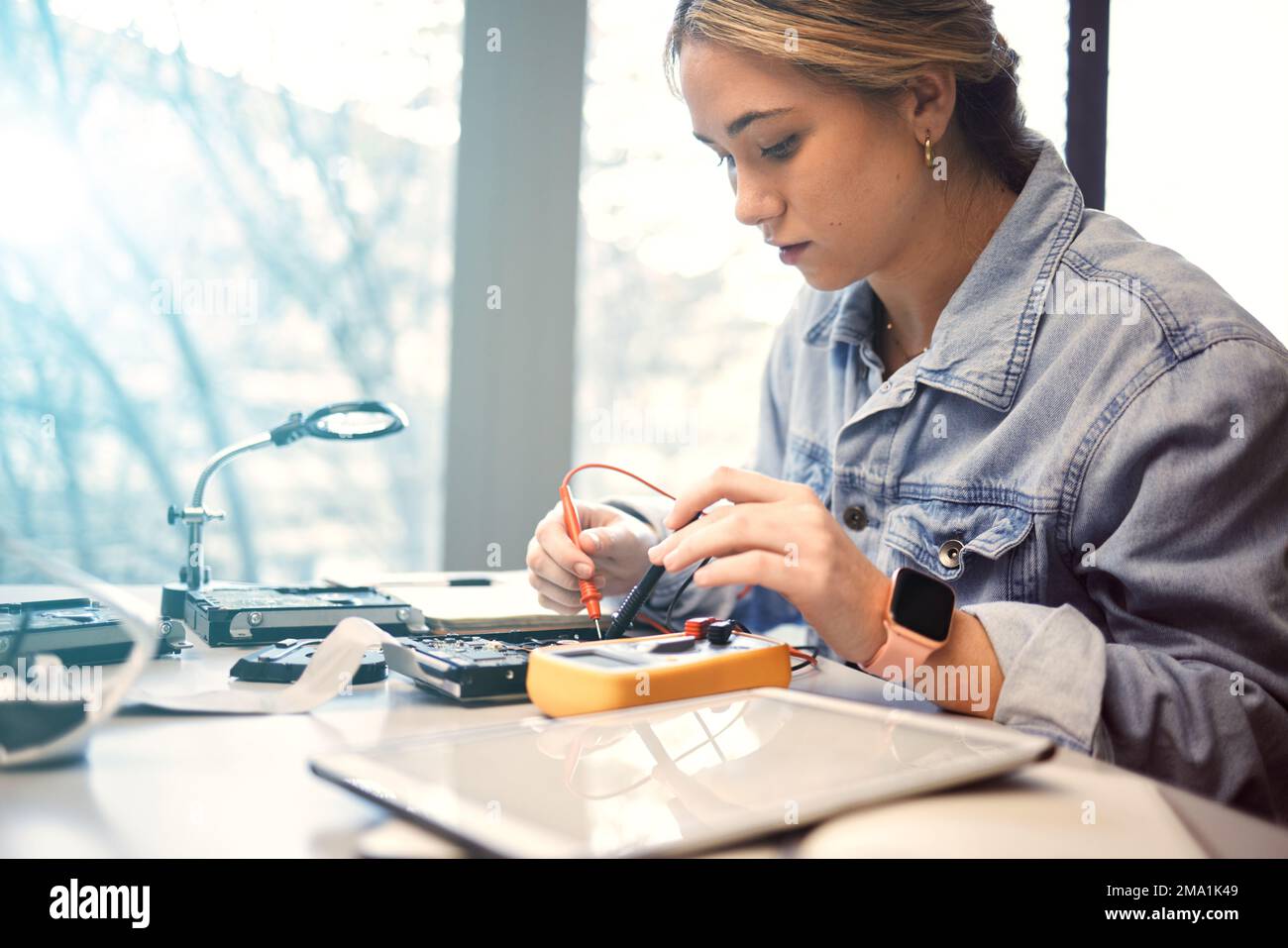 Engineering, college student and electronics with woman learning for electrical project ...