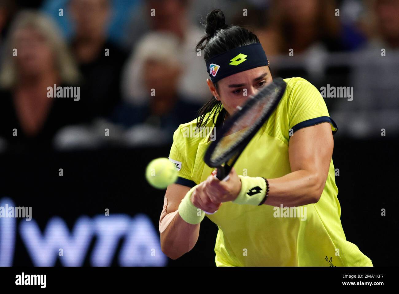 Ons Jabeur of Tunisia returns a shot against Jessica Pegula during ...