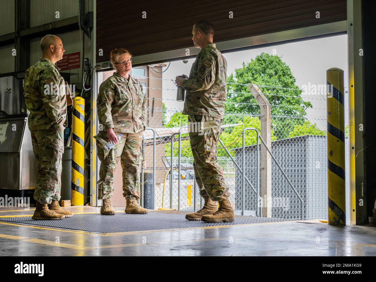 Chief Master Sgt. Jeremiah Grisham, 521st AMOW command chief (left), and U.S. Air Force Col ...