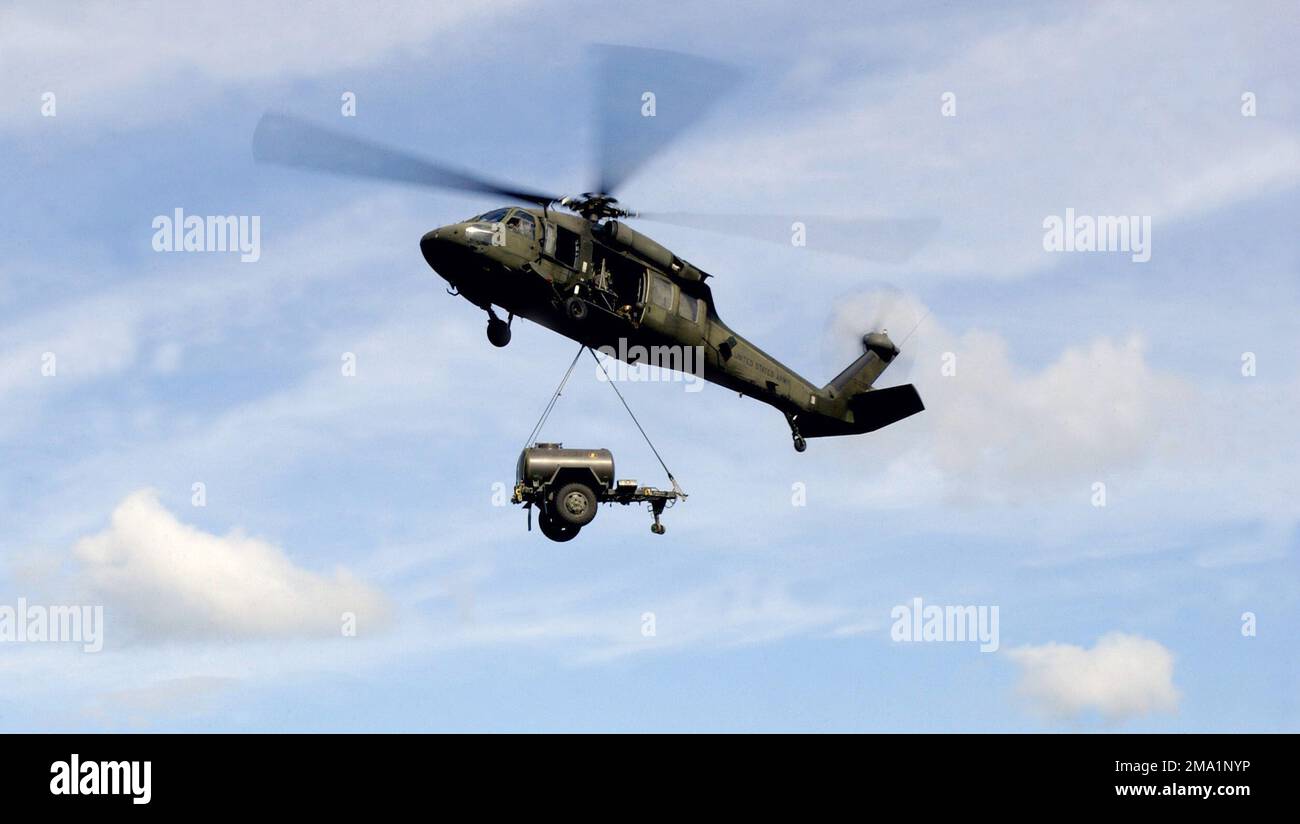 040617-F-6335P-225. [Complete] Scene Caption: A Colorado Army National ...