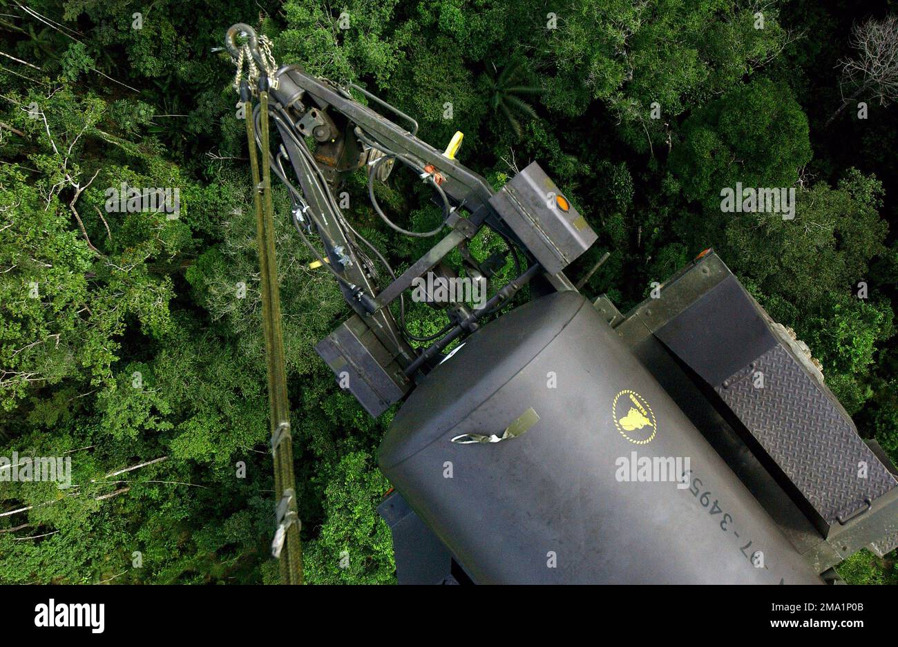 040618-F-6335P-389. [Complete] Scene Caption: A Water Mule gets an ...