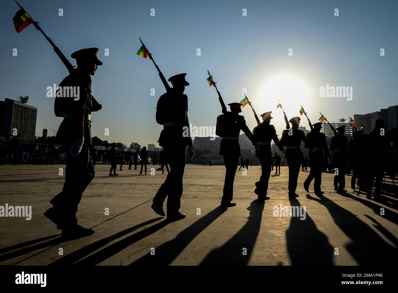FILE - Ethiopian military parade with national flags attached to their ...