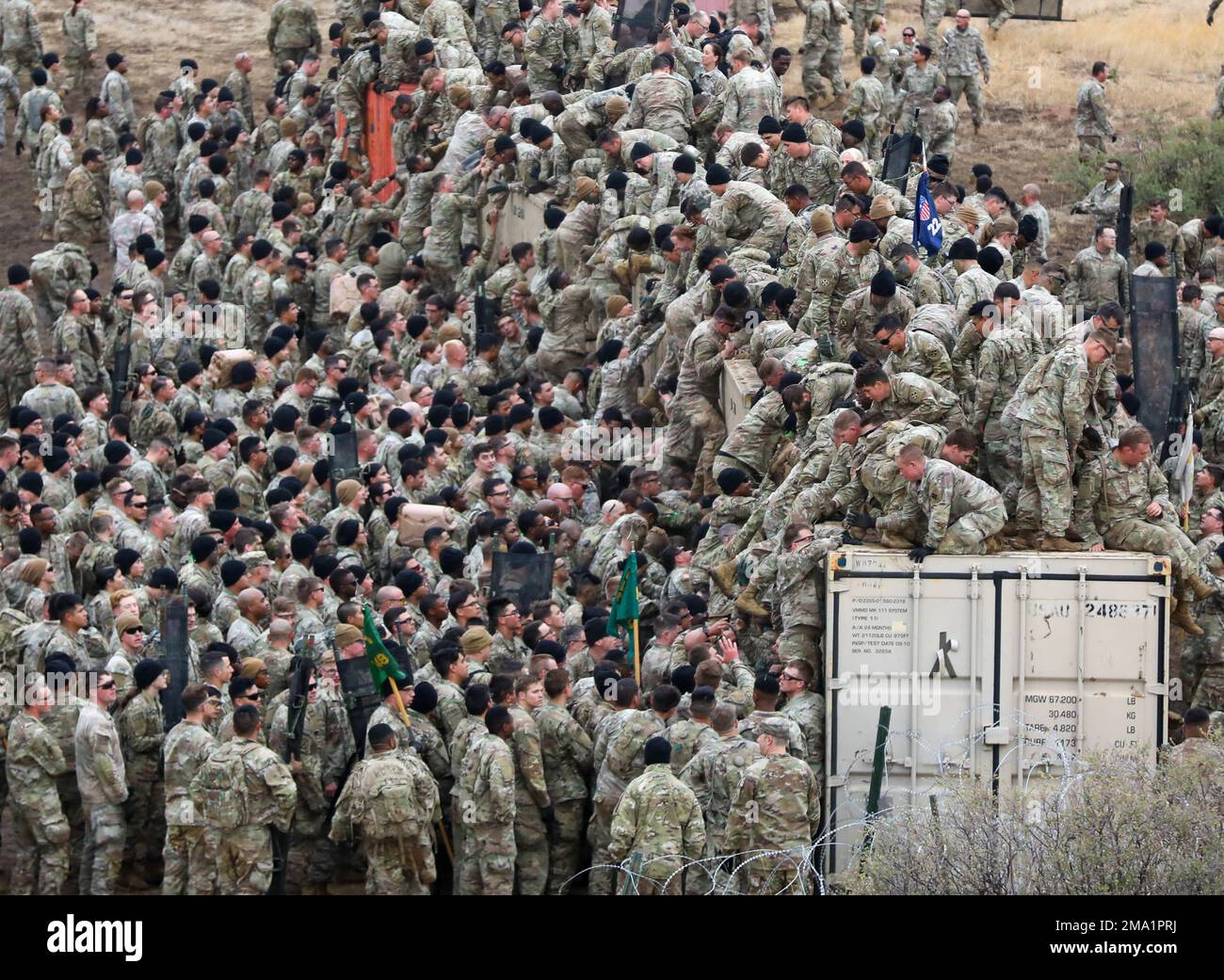 4th Infantry Division Soldiers swarmed a container wall obstacle during ...