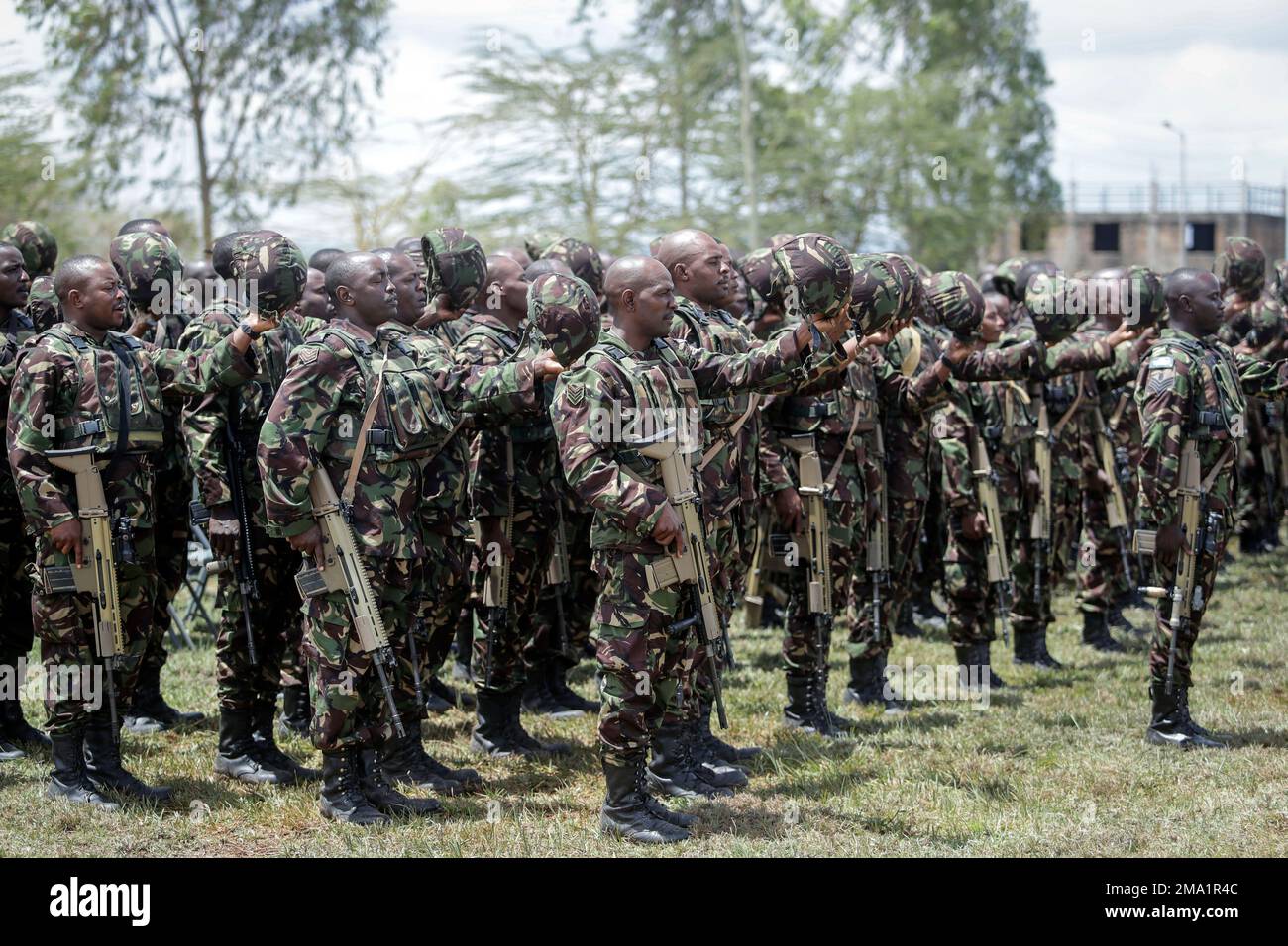 Members of the Kenya Defence Forces (KDF) take part in a flag-handover ceremony, ahead of a ...