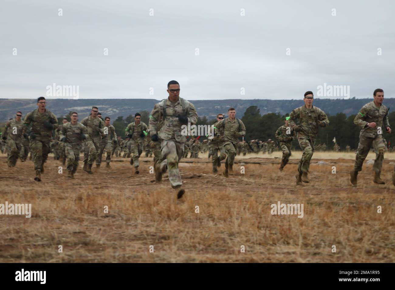 4th Infantry Division Soldiers charge the first obstacle during the ...