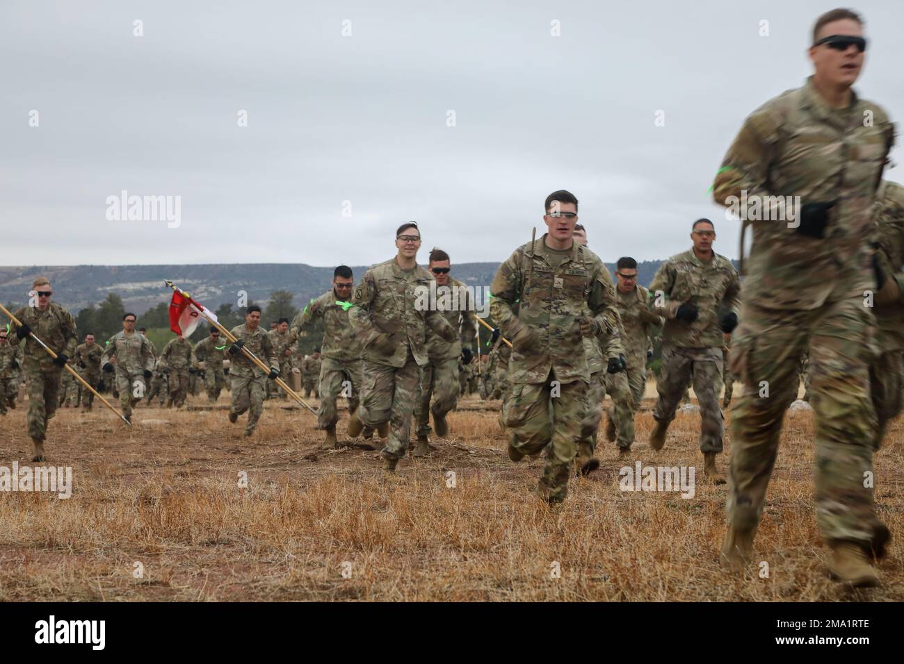 4th Infantry Division Soldiers charge the first obstacle during the ...