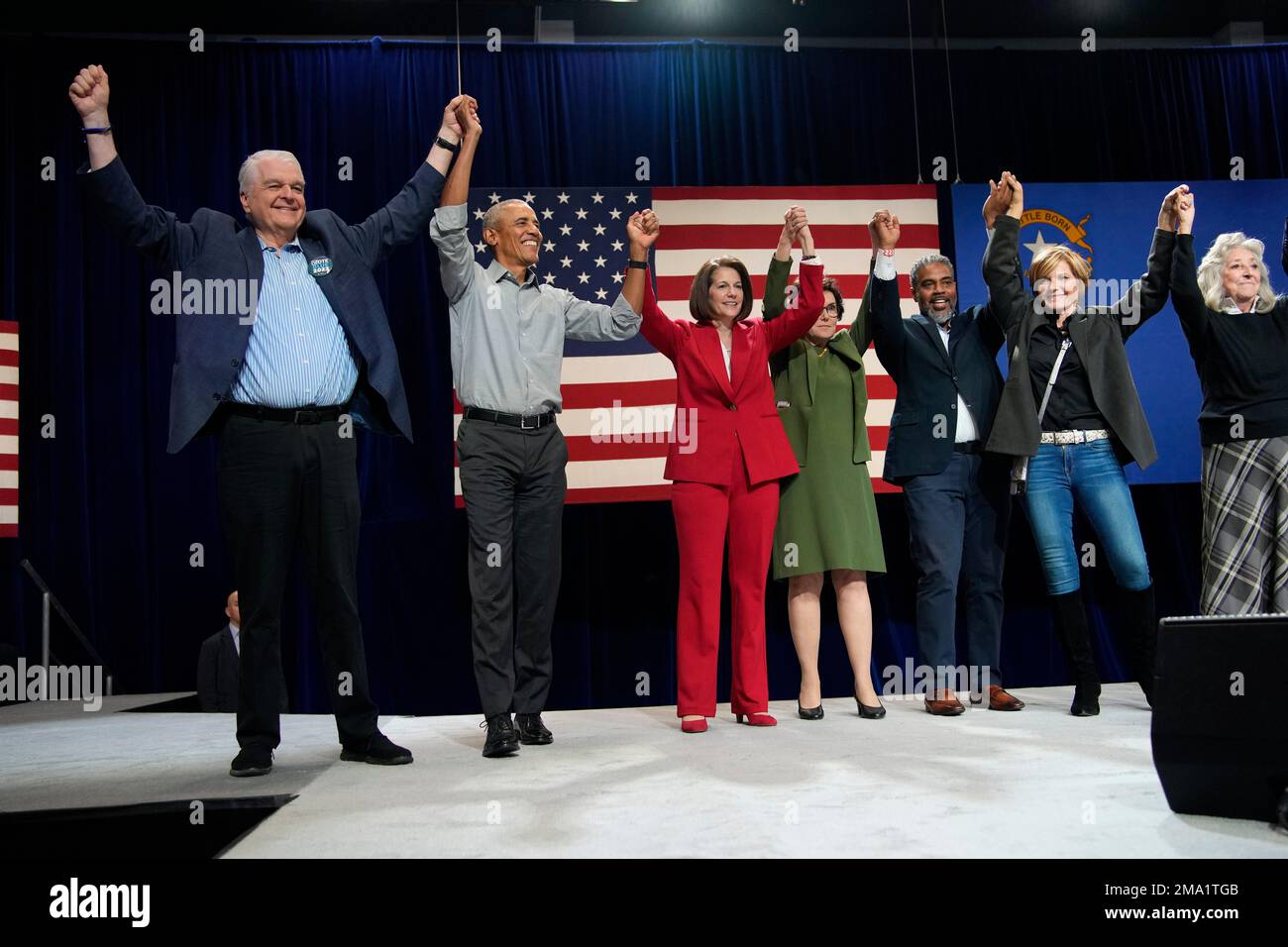 Nevada Gov. Steve Sisolak, from left, former President Barack Obama ...