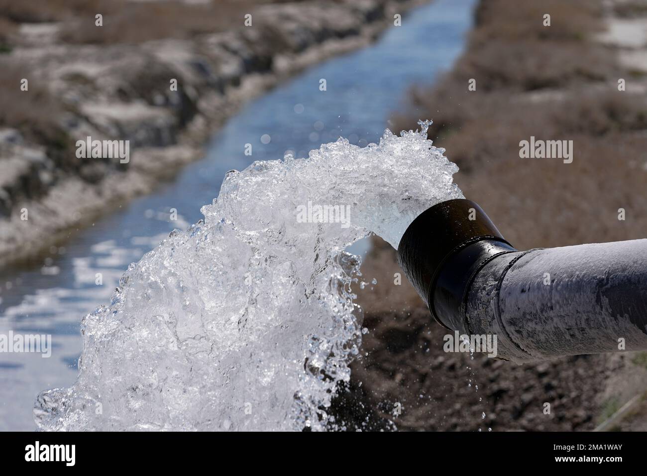 Intrepid Potash pumps brine in to a canal at the Bonneville Salt Flats ...